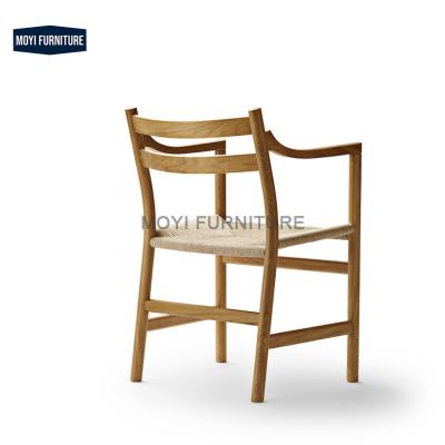 China Arm Dining Chair Made of Solid Ash Wood Frame with Woven Rattan on the Seat for Indoor and Outdoor Use for sale