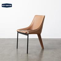 China Refined Top-Stitching  Leather Upholstered Comfortable Padded Dining Room Dining Chairs With Unique 3-Leg Structures for sale