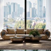 China Modern Creative Conch Sofa Leather High-End Luxury Curved Design Extendable for Villa Living Room or Apartment for sale