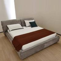 China Modern Upholstered Modern King Size Double Beds Italian Design Bedroom Fabric Leather Furnitures Casablanca Down Filling Bed for sale
