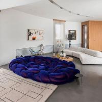 China Italy's Unique Creative Design Three-seat Twist Sofa Light Luxury, Soft Fabric, Casual and Fun Legless Sofa for sale