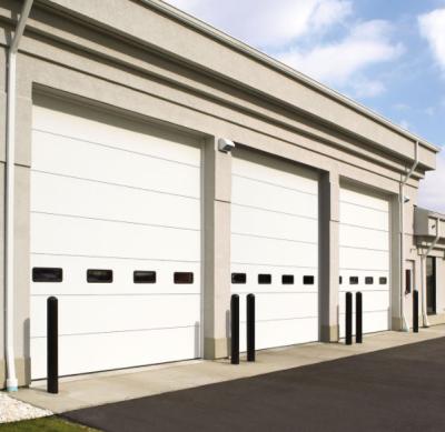 China CE 2.0mm Insulated Sectional Industrial Doors Automatic Overhead Steel Sliding Roll Up for sale