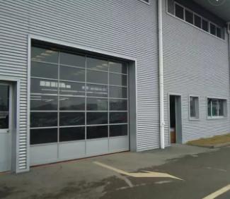 China Frosted Glass Transparent Garage Door Full View Aluminum Sectional For Villa for sale