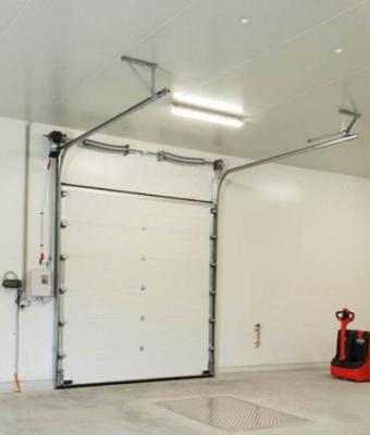 China Fire Station Insulated Overhead Sectional Door With Powder Coated IP 54 Protection Class for sale