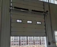 China Powder Coated Insulated Sectional Overhead Doors 24DB 50HZ For Warehouse for sale