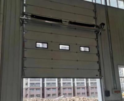 China Powder Coated Insulated Sectional Overhead Doors 24DB 50HZ For Warehouse for sale