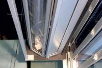 China Aluminum Transparent High Speed Spiral Door Safety System Vertical Overhead 220V/50HZ for sale