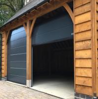China Customized Insulated Sectional Doors With Powder Coated Finish Vertical Lift Door for sale