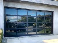 China Automatic Folding Aluminum Sectional Door High Safety Overhead Tempered Glass Plexiglass for sale