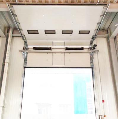 China Manual Operation Insulated Sectional Overhead Doors Durable Steel Insulating Automatic for sale