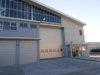 China PLC Control High Speed Spiral Roller Door Powder Coated Roll Up Door 220mm Aluminum Slats for sale