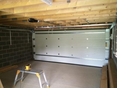 China 50mm-80mm Insulated Sectional Garage Door Weather Resistance For Commercial Vertical for sale