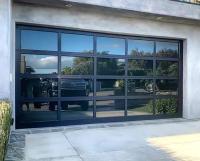 China Tempered Mirror Glass Aluminum Sectional Door With Sound Insulation Transparent for sale