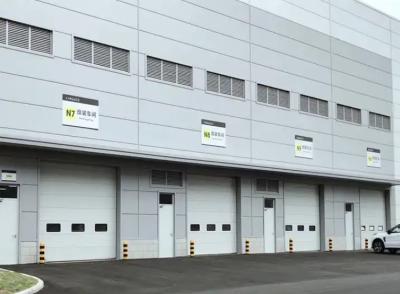 China White Color Steel Sectional Door 50mm-80mm Thickness For Commercial Buildings for sale