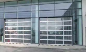 China Sound Attenuation Aluminum Sectional Door Exterior Insulated Automatic Remote For Garage for sale