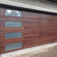 China Automatic Formed Double-skinned Steel Industrial Overhead Sectional Doors for Fire Station Insulated Flap Sliding for sale