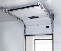 China Wind Resistant White Foam Filled Overhead Sectional Garage Door Auto / Manual Operation Safety Edge Photocell for sale