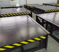 China Customizable Powder Coated/Galvanized Loading Dock Leveler with Safety Chains and Handheld Remote Controls for sale