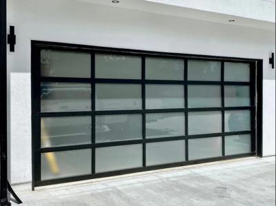 China Soundproof Aluminum Alloy Sectional Door With Double Glazing Glass And Powder Coating Surface for sale