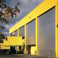 China Powder Coated Steel Insulated Sectional Doors with Vinyl Brush Weatherstripping Insulated Overhead for sale