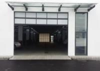 China Modern Double Glazing Aluminum Sectional Door with Excellent Insulation Professional Manufacture Brown Color Glass Door for sale