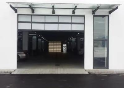 China Modern Double Glazing Aluminum Sectional Door with Excellent Insulation Professional Manufacture Brown Color Glass Door for sale