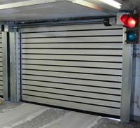 China Vertical Lifting Vinyl Weatherstripping Insulated Sectional Steel Doors With Polyurethane Foam for sale