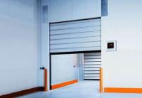 China Lockable Wind Resistant Automatic Sliding Metal Steel Overhead Steel Sectional Doors With Foam Insulation for sale
