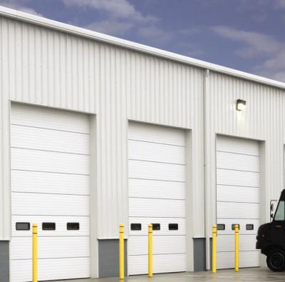China 50mm-80mm Insulated White Steel Sectional Garage Doors with Aluminum Or Vinyl Threshold for sale