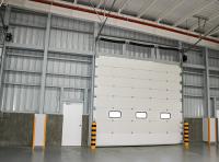 China Commercial Sectional Doors With 50mm-80mm Thickness Insulated Panels And Durable Steel Construction for sale