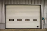 China Aluminum Or Vinyl Threshold Commercial Sectional Doors With 50mm-80mm Thickness And Polyurethane Foam Insulation for sale