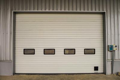 China Aluminum Or Vinyl Threshold Commercial Sectional Doors With 50mm-80mm Thickness And Polyurethane Foam Insulation for sale