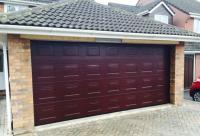 China Customized Industrial PU Anti-pinch Mechanical Wind Load Up to 150 Mph Commercial Sectional Doors with Stainless Steel Hardware and U-Value Up To U-0.57 for sale