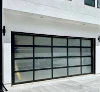 China Automatic Electric Rolling Exterior Safety High Water Tightness Class 3 Transparent Garage Door Glass Sectional Garage Door for sale