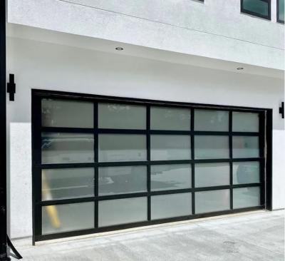 China Automatic Electric Rolling Exterior Safety High Water Tightness Class 3 Transparent Garage Door Glass Sectional Garage Door for sale