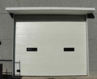 China Flat Or Contoured Panel Design Insulated Sectional Garage Door Commercial For Mall 50mm-80mm Thickness Industrial Vertical Lift Door for sale