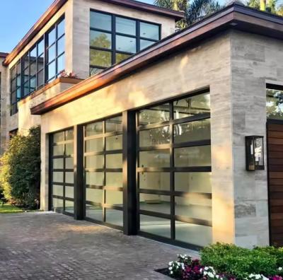 China Water Tightness Class 3 Transparent Glass Sectional Garage Door For Residential House Enhance Home's Curb Appeal for sale