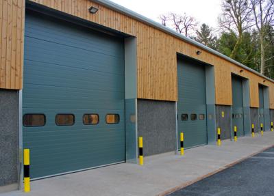 China Commercial Sectional Overhead Doors With Weather Sealed Protection And Lockable Handle for sale