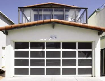 China Modern Design Style Water Tightness Class 3 Transparent Glass Sectional Garage Door With Powder Coating for sale