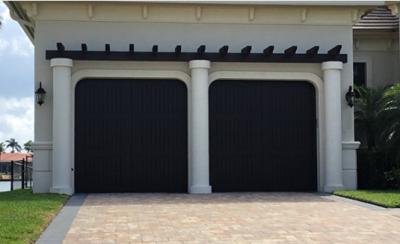China 50mm-80mm Thickness Insulated Sectional Garage Door Commercial Optional Ventilation Powder Coated Finish for sale