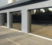China Customized Commercial Double Glazing Glass Sectional Garage Door With Water Tightness Class 3 And Manual Or Automatic for sale