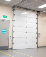 China Powder Coated Sectional Overhead Door 50mm-80mm Thickness Insulated Sectional Garage Door Commercial for sale