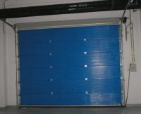 China Commercial Automatic Warehouse Fire Station Industrial Sectional Doors Wind Resistance Automatic Formed Steel Material for sale