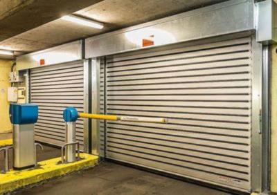 China Safe Aluminum Transparent High Speed Spiral Door With Photoelectric Sensor Safety System And Air Permeability ≤2.0m3/ M2.s for sale