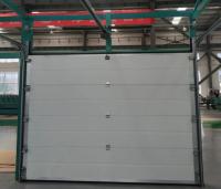 China Customized Fire Station Industrial Sectional Doors Powder Coated Finish Automatic Formed Design for sale