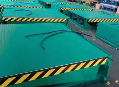 China Electric Dock Door Levelers Workshop Automatic Dock Plate 25000-40000LBS Safe Design For Safe Loading Steel Automatic Mechanical Loading Cylinder Hydraulic Dock Ramp Leveler for sale
