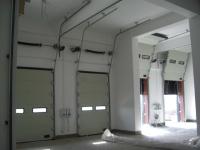China Commercial 50mm-80mm Thickness Insulated Sectional Garage Door With Optional Ventilation for sale