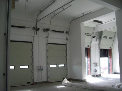 China Commercial 50mm-80mm Thickness Insulated Sectional Garage Door With Optional Ventilation for sale