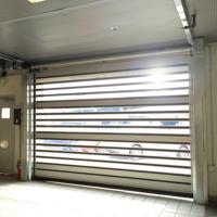 China Intelligent Exterior Spiral Fast Door Industrial Spiral Hard Aluminum High Speed Spiral Door Safety and Efficiency for Heavy Duty Industrial Applications for sale