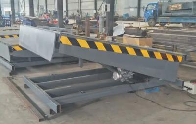China Handheld Remote Control Cheap Logistic Lift Table Fixed Hydraulic Container Dock Door Levelers Workshop Automatic Ramp Electric Leveler for sale